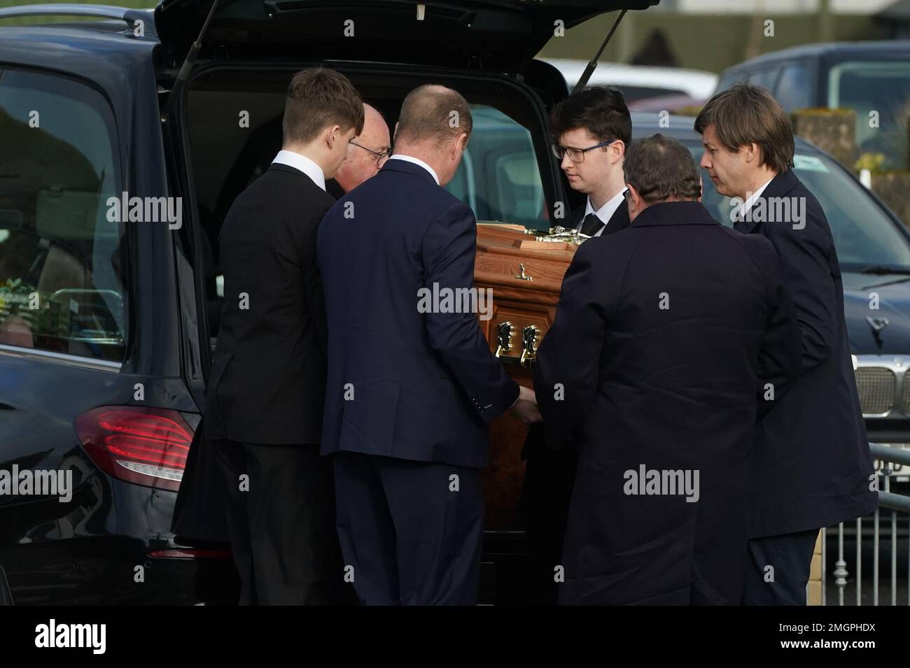 Pallbearers carry the coffin of Matthew Healy into St Mary's Church in ...