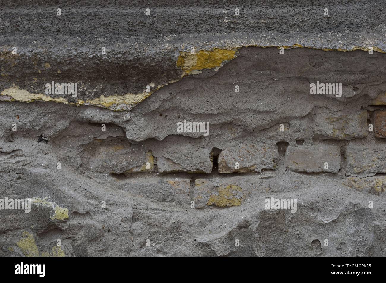 Old brick,damaged gray wall concept background Stock Photo - Alamy