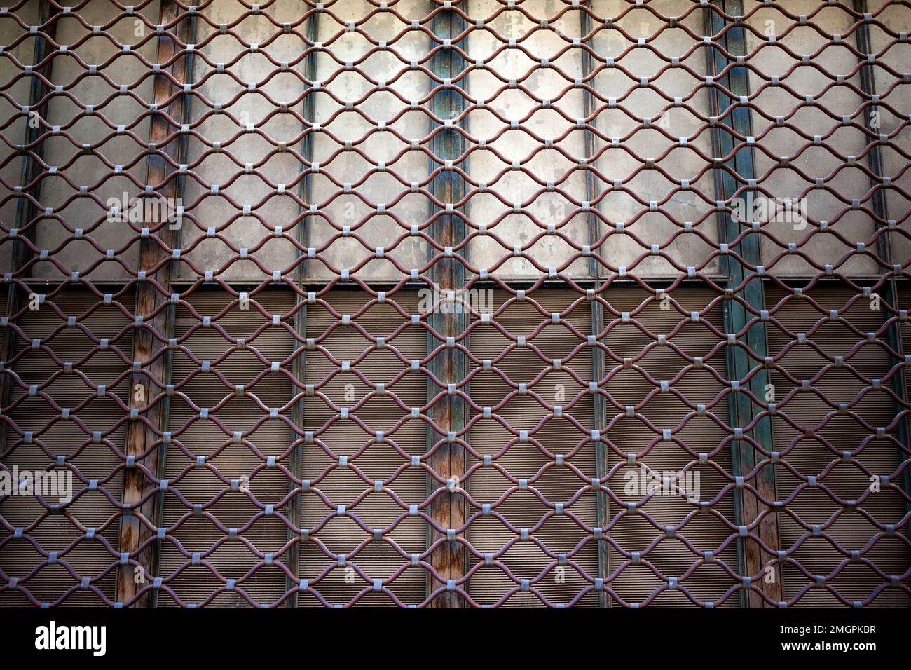 Iron curtain background on a facade Stock Photo - Alamy