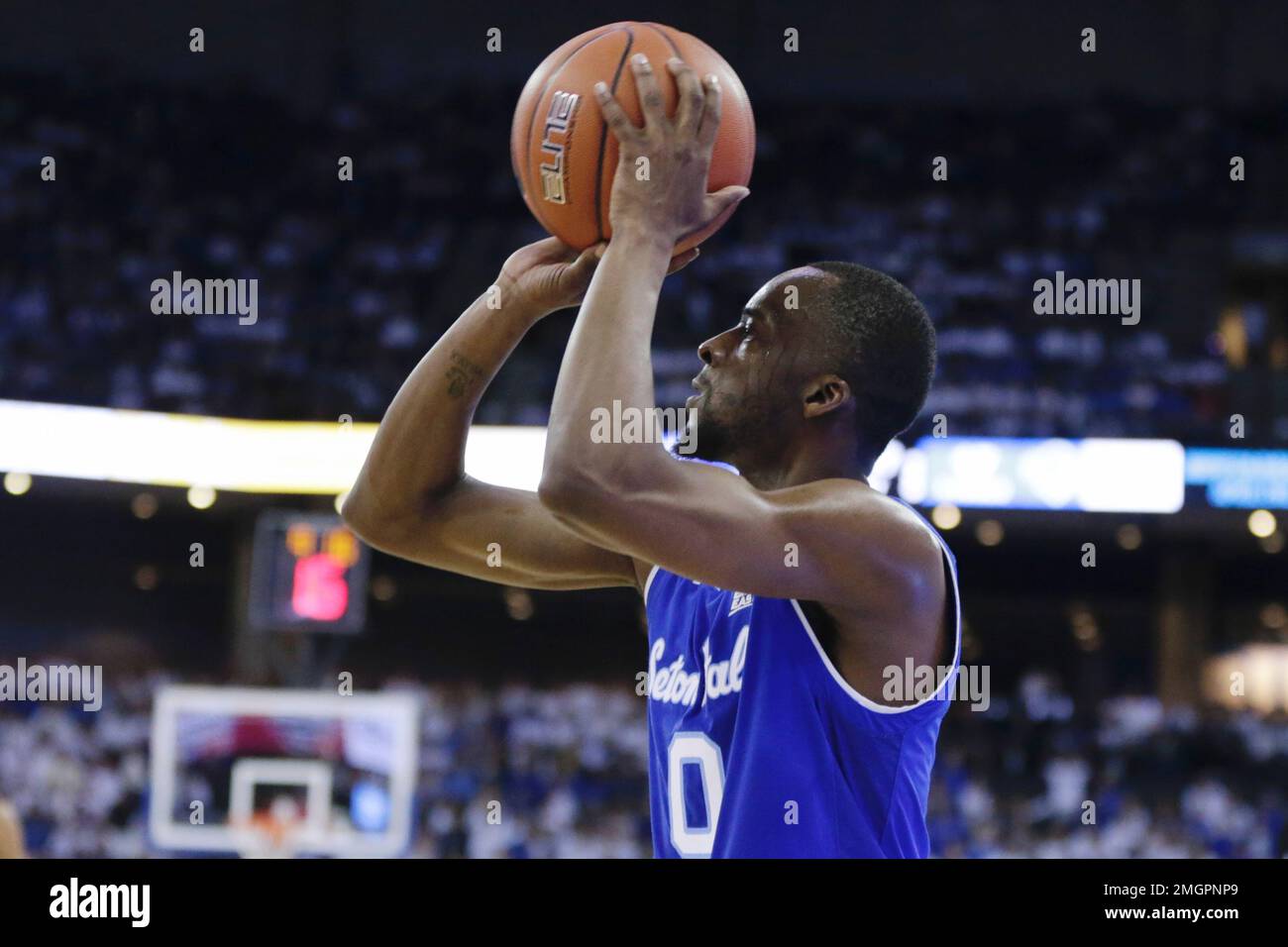 Seton Hall's Quincy McKnight (0) shoots during the first half of an ...