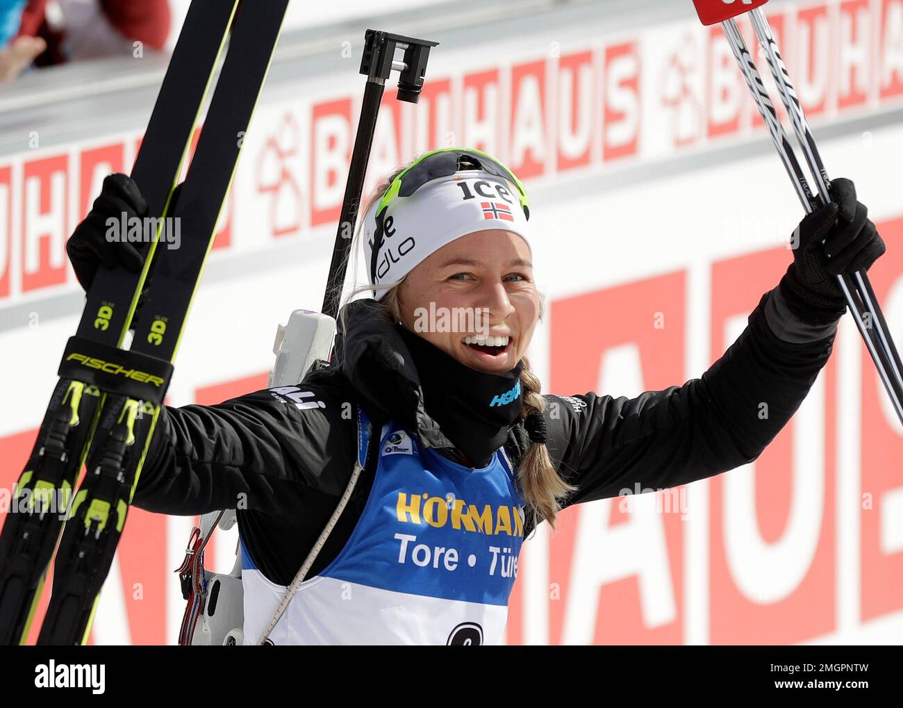 Norway's Tiril Eckhoff celebrates after winning the women's Biathlon ...