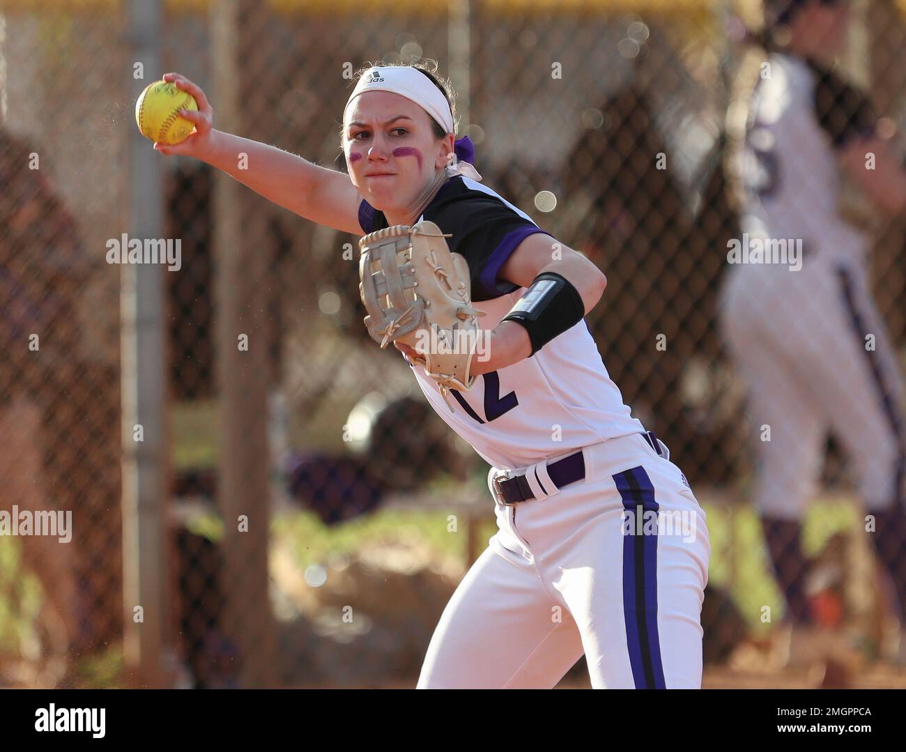 Holly Cross infielder Bella Jankowski #12 during an NCAA softball game ...