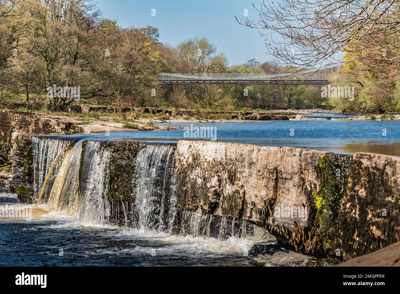 A cascade on the River Tees close to the Grade II* listed Whorlton ...