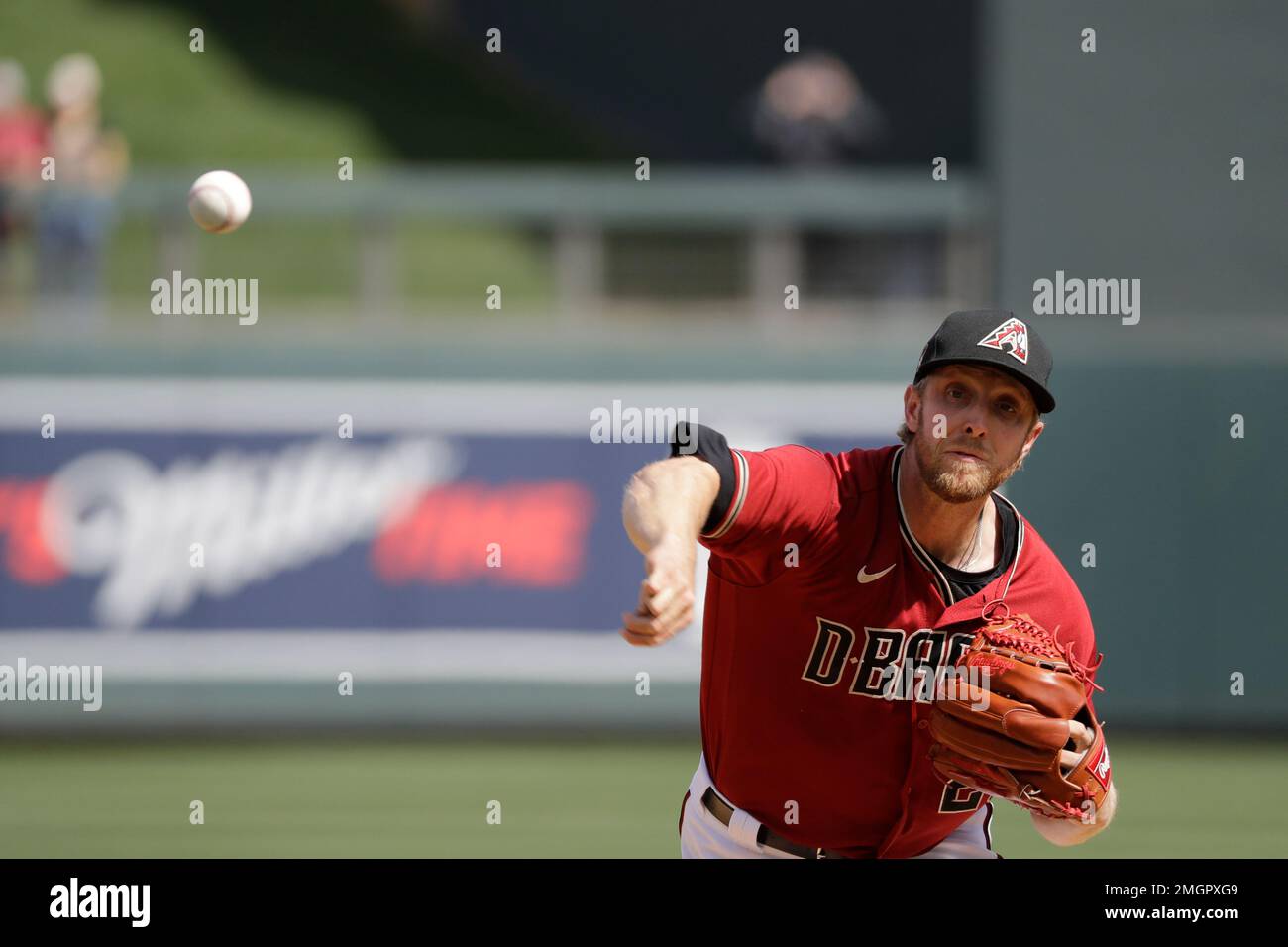 Arizona Diamondbacks' Merrill Kelly throws during a spring training ...