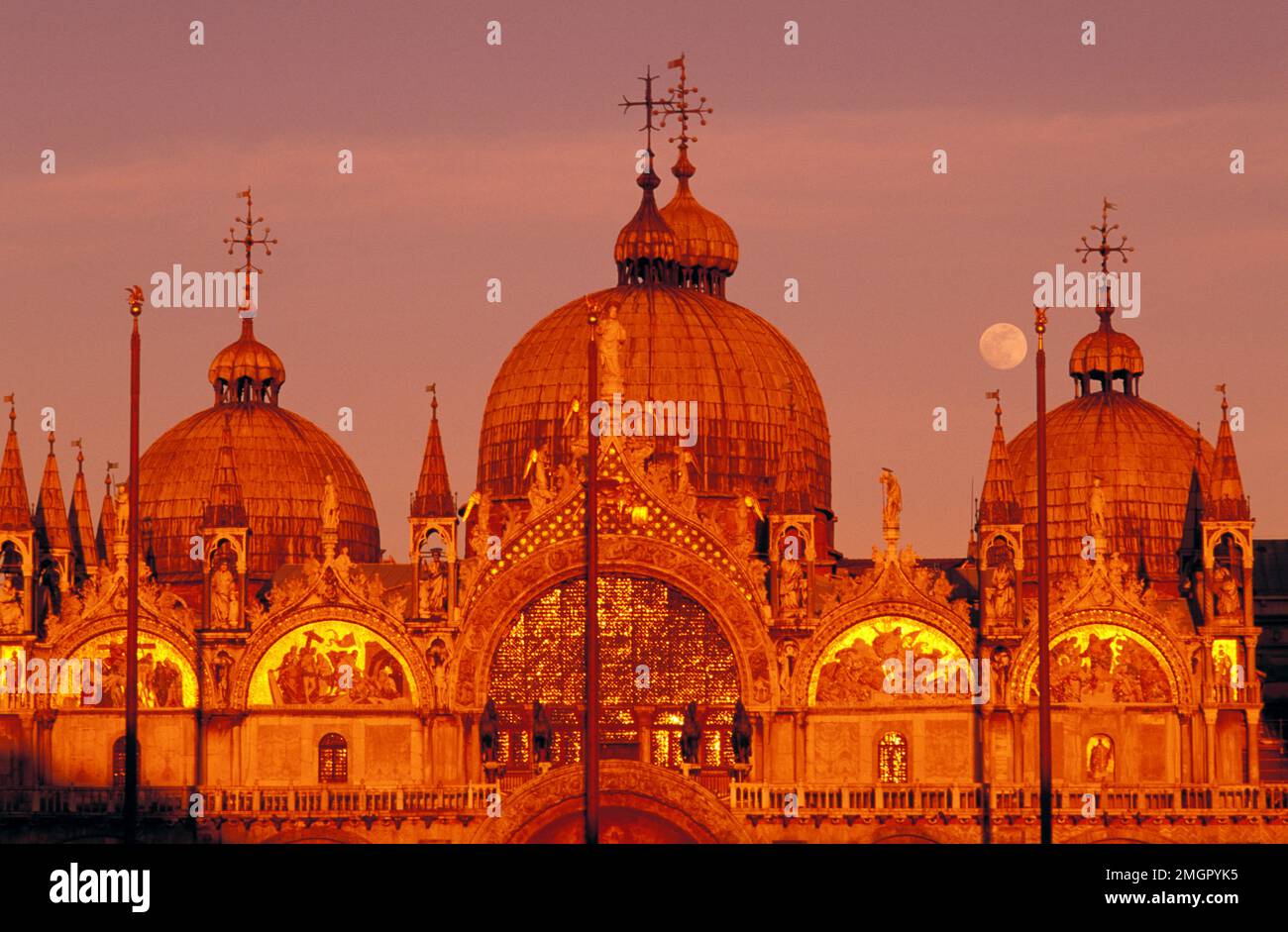 Italy Venice Basilica San Marco illuminated by the setting sun and a ...