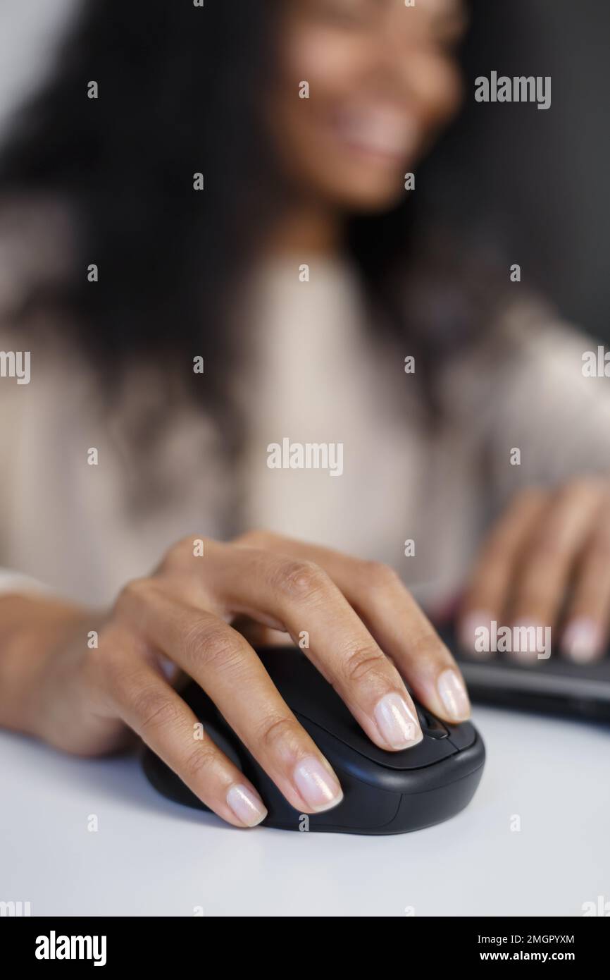 Woman hand clicking wireless mouse hi-res stock photography and images ...