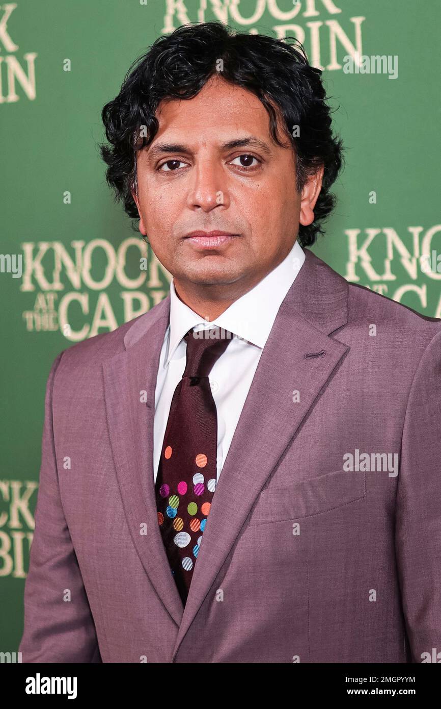 Director M. Night Shyamalan poses for photographers upon arrival at the ...