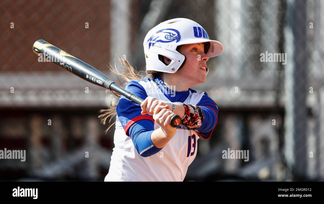 UMass Lowell's Marianne Sparacia connects for a hit during an NCAA ...