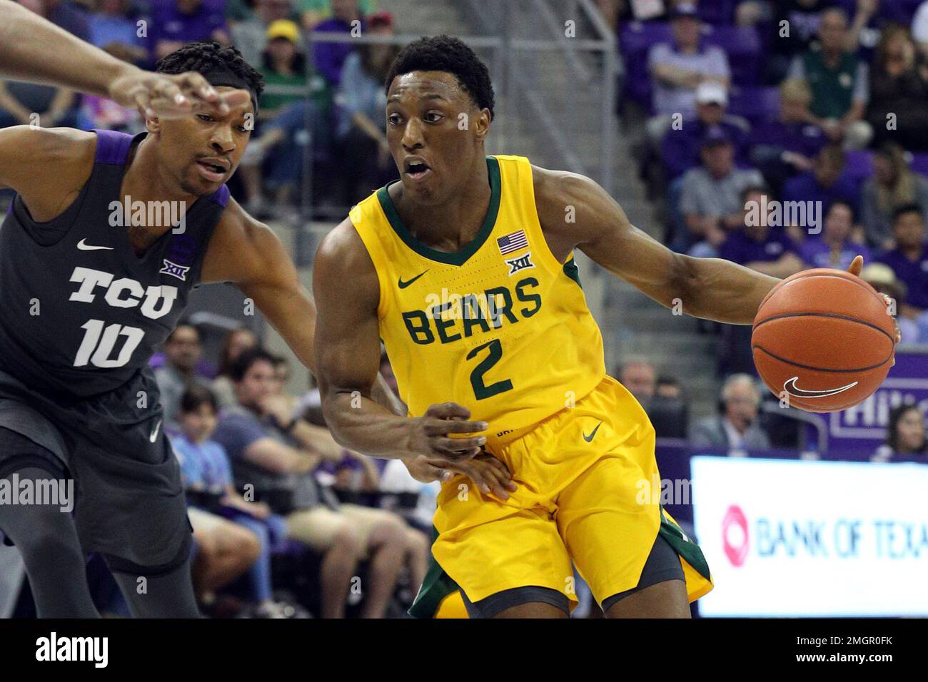 TCU forward Diante Smith (10) defends against the drive Baylor guard ...
