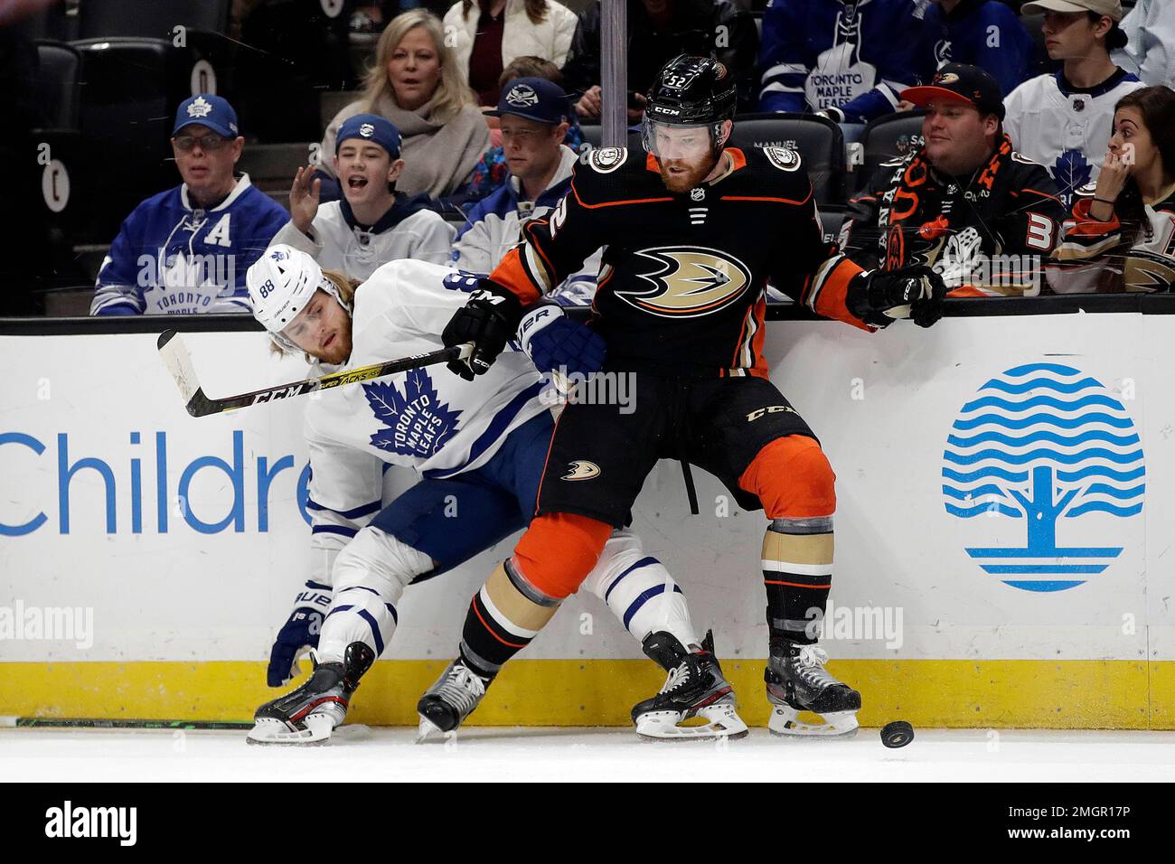 Anaheim Ducks' Matt Irwin, right, collides with Toronto Maple Leafs ...