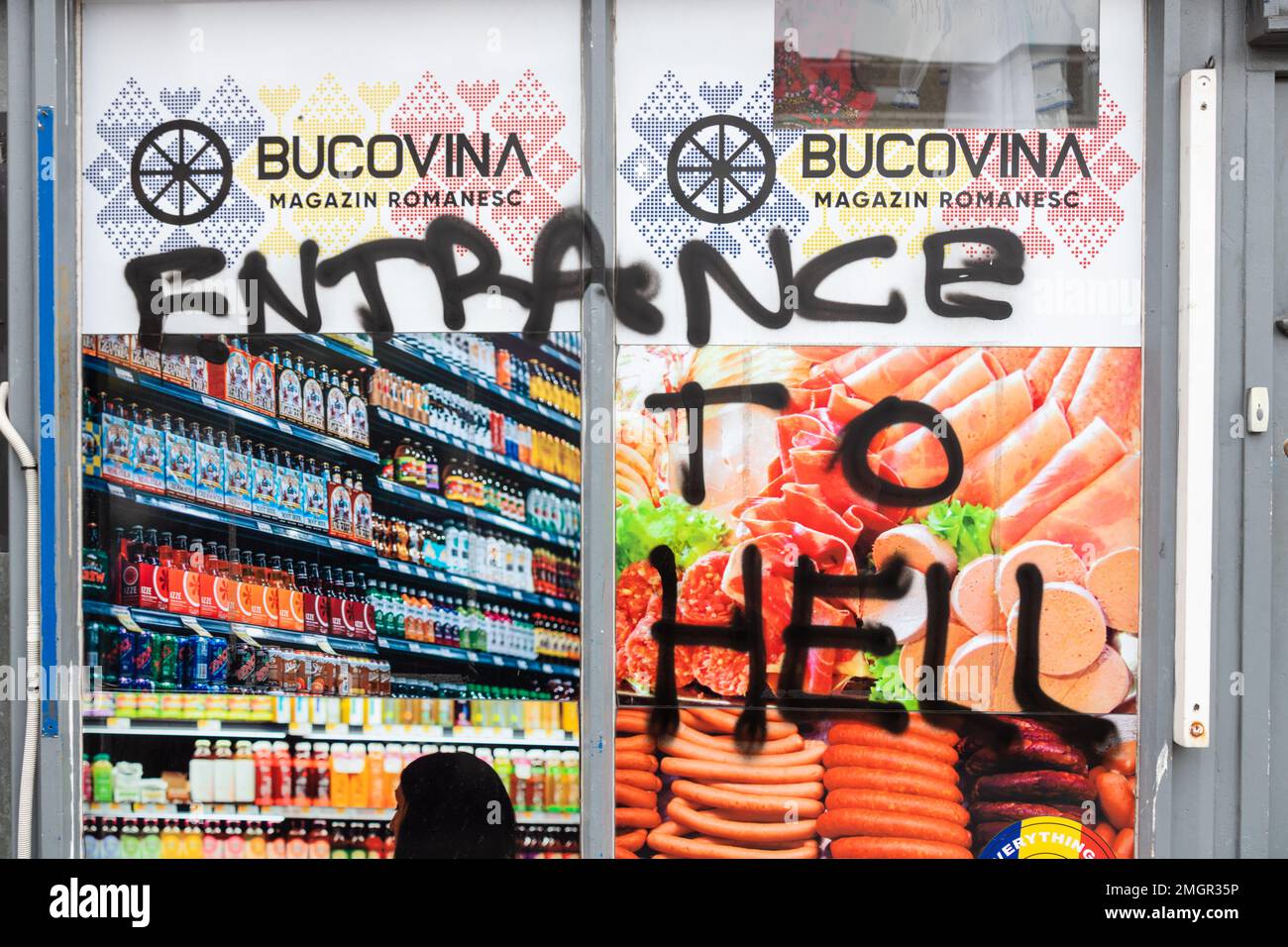 Graffiti on a romanian shop in bristol hi-res stock photography and ...