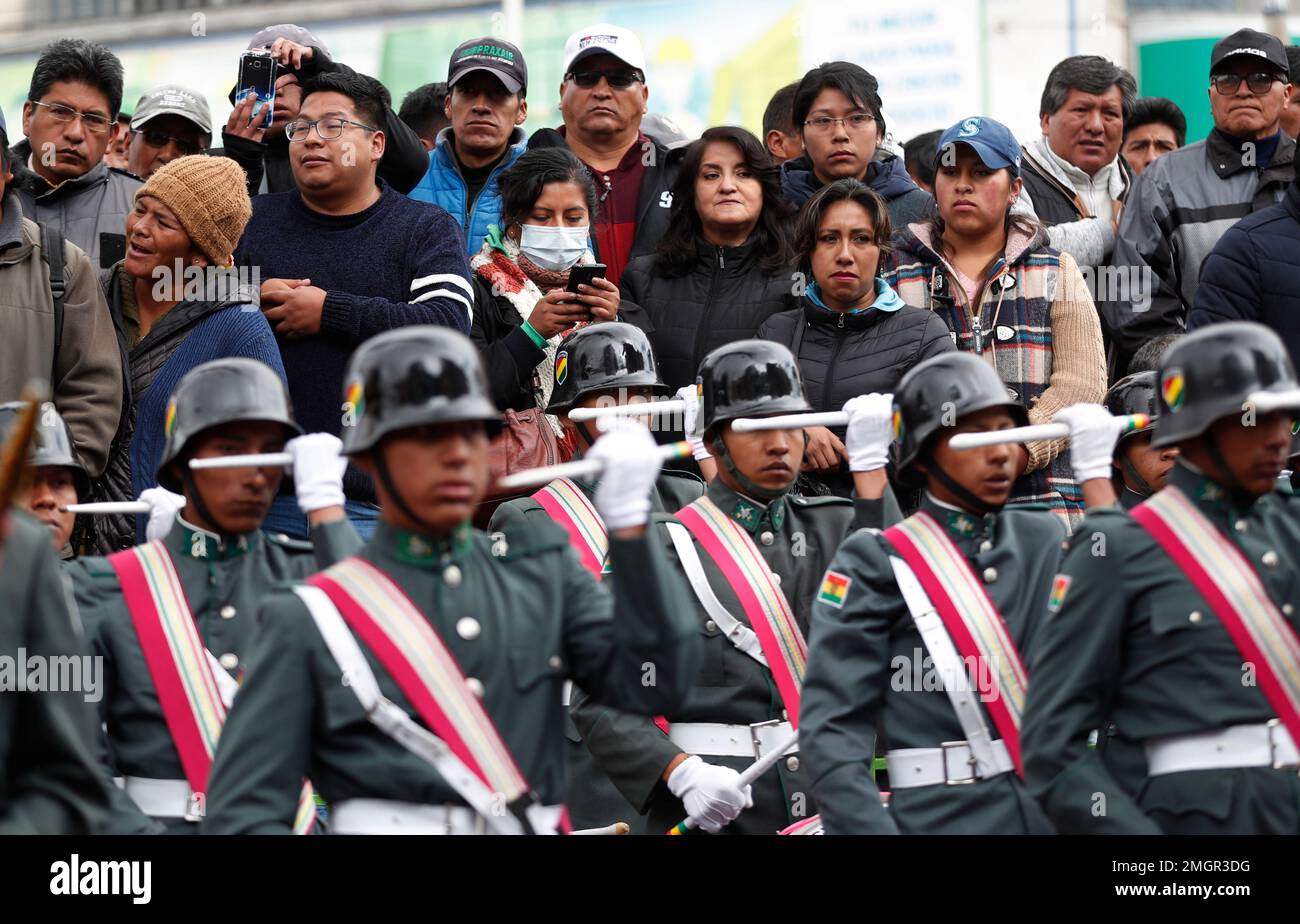 People watch a military parade marking the 35th anniversary of the ...