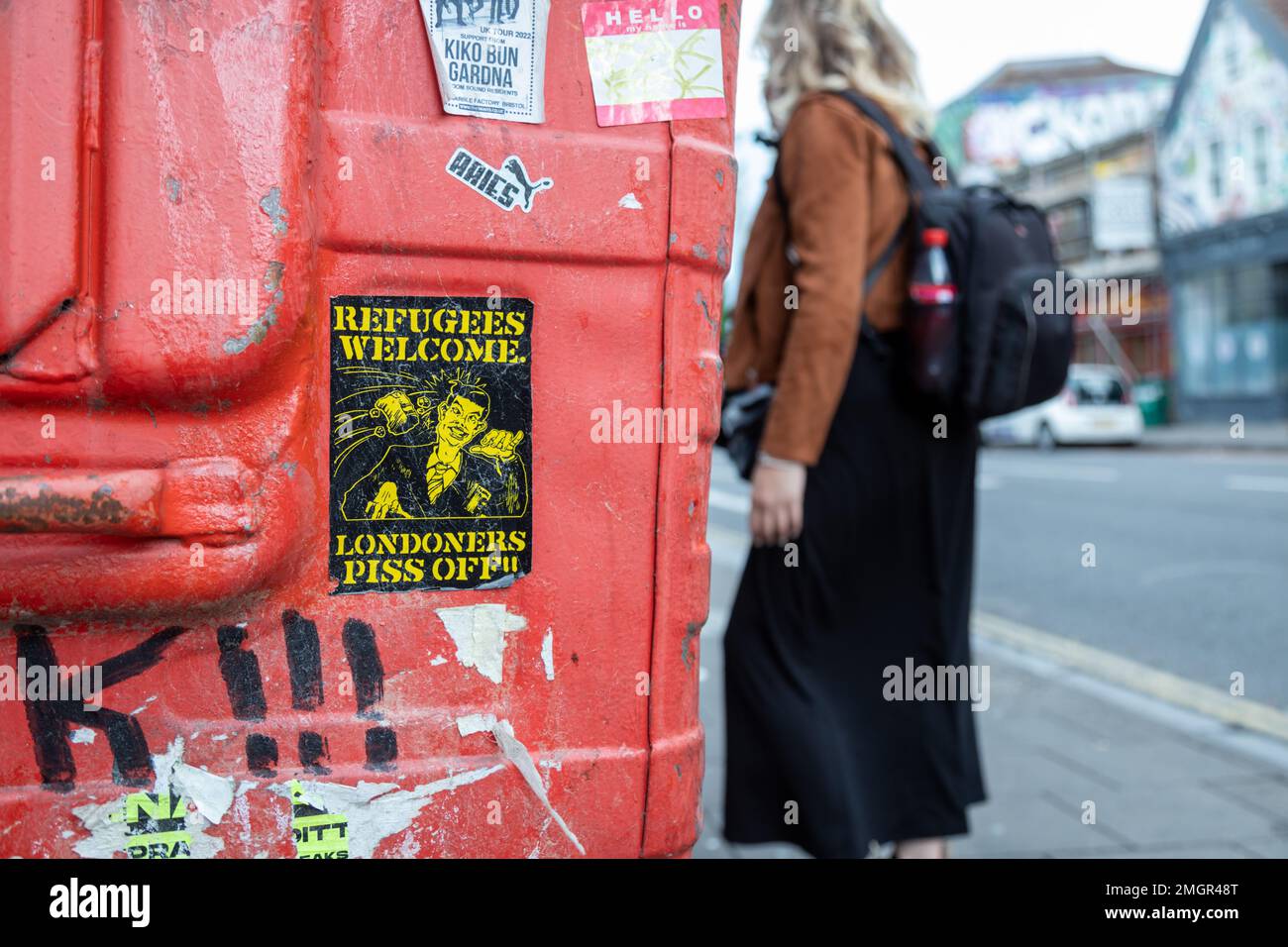 Sticker on a postbox saying Refugees Welcome Stock Photo - Alamy