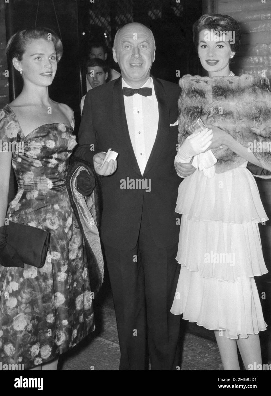 Director Otto Preminger with top US model Hope Bryce, right, and the ...