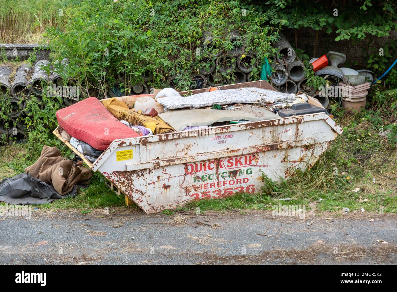 Skip full of rubbish. UK Stock Photo - Alamy