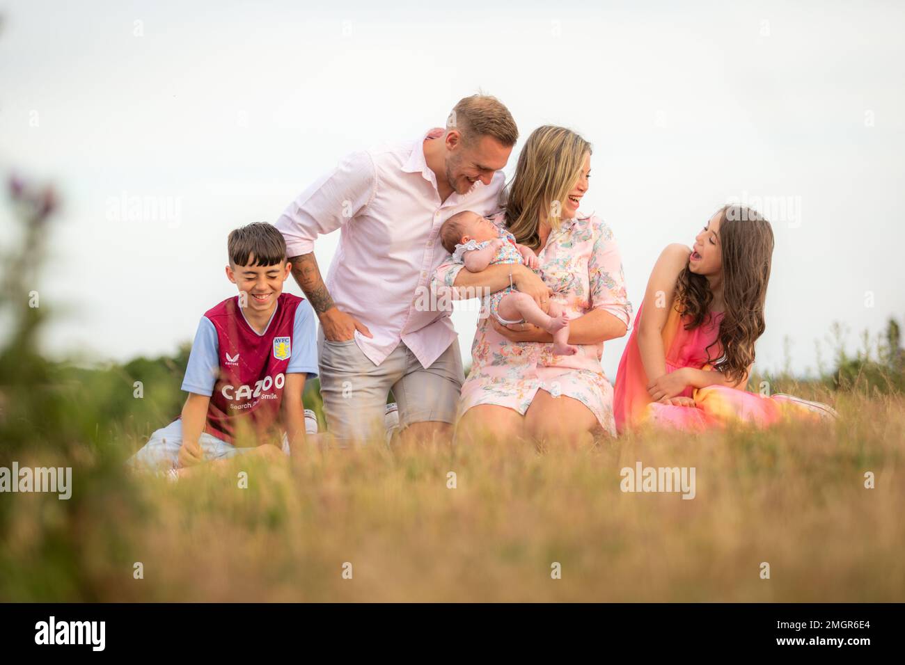 British white family looking happy and having fun outside Stock Photo ...