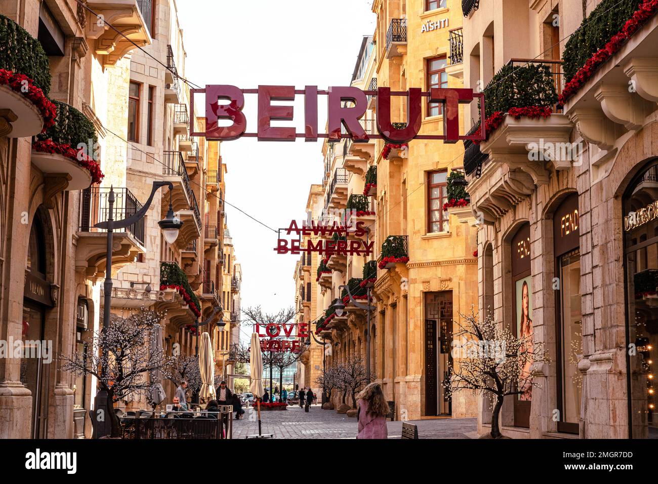 Popular commercial street in Beirut old city. Large hanging inscription ...