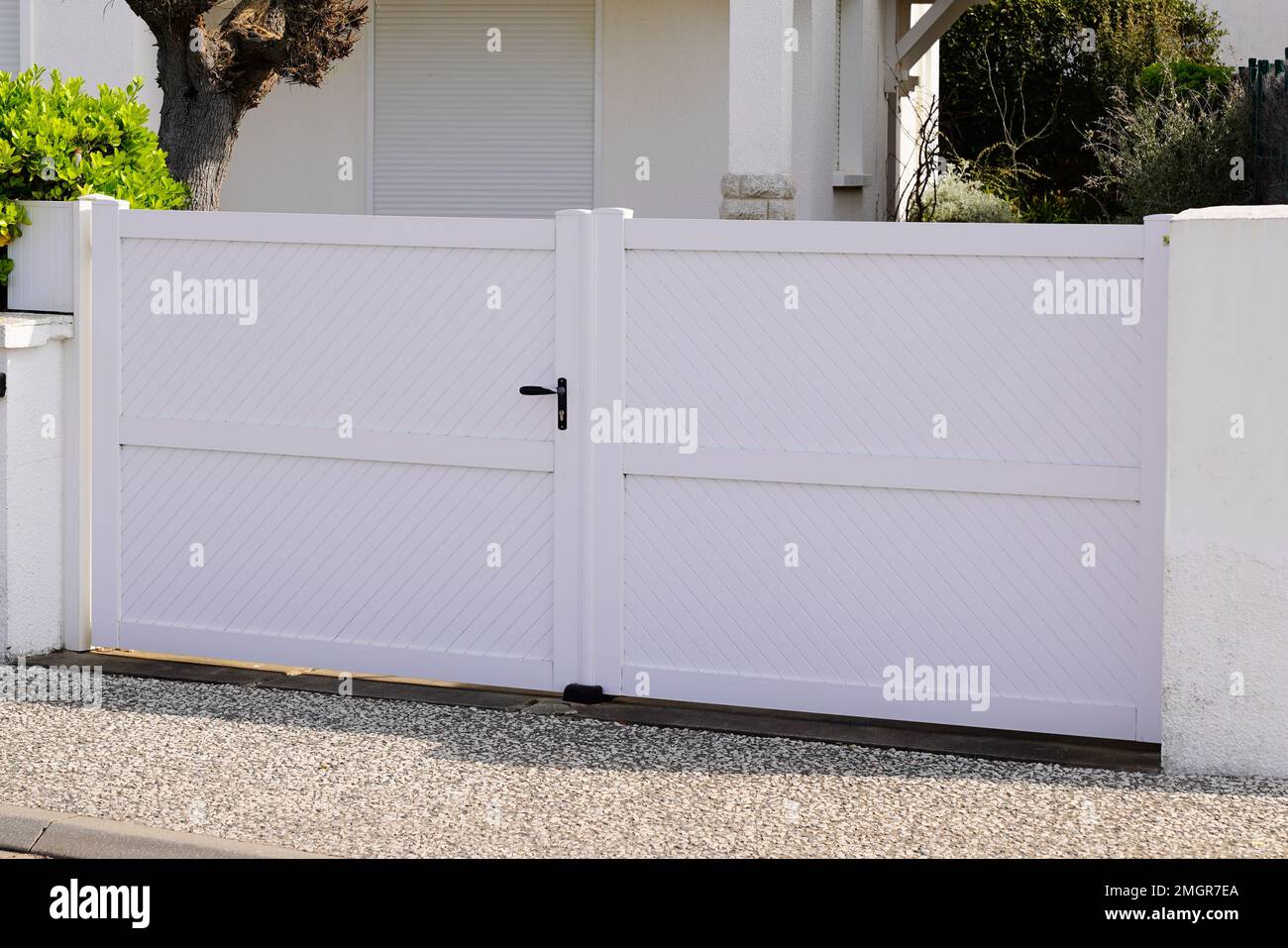 door white steel home gate style double portal of suburbs house Stock ...