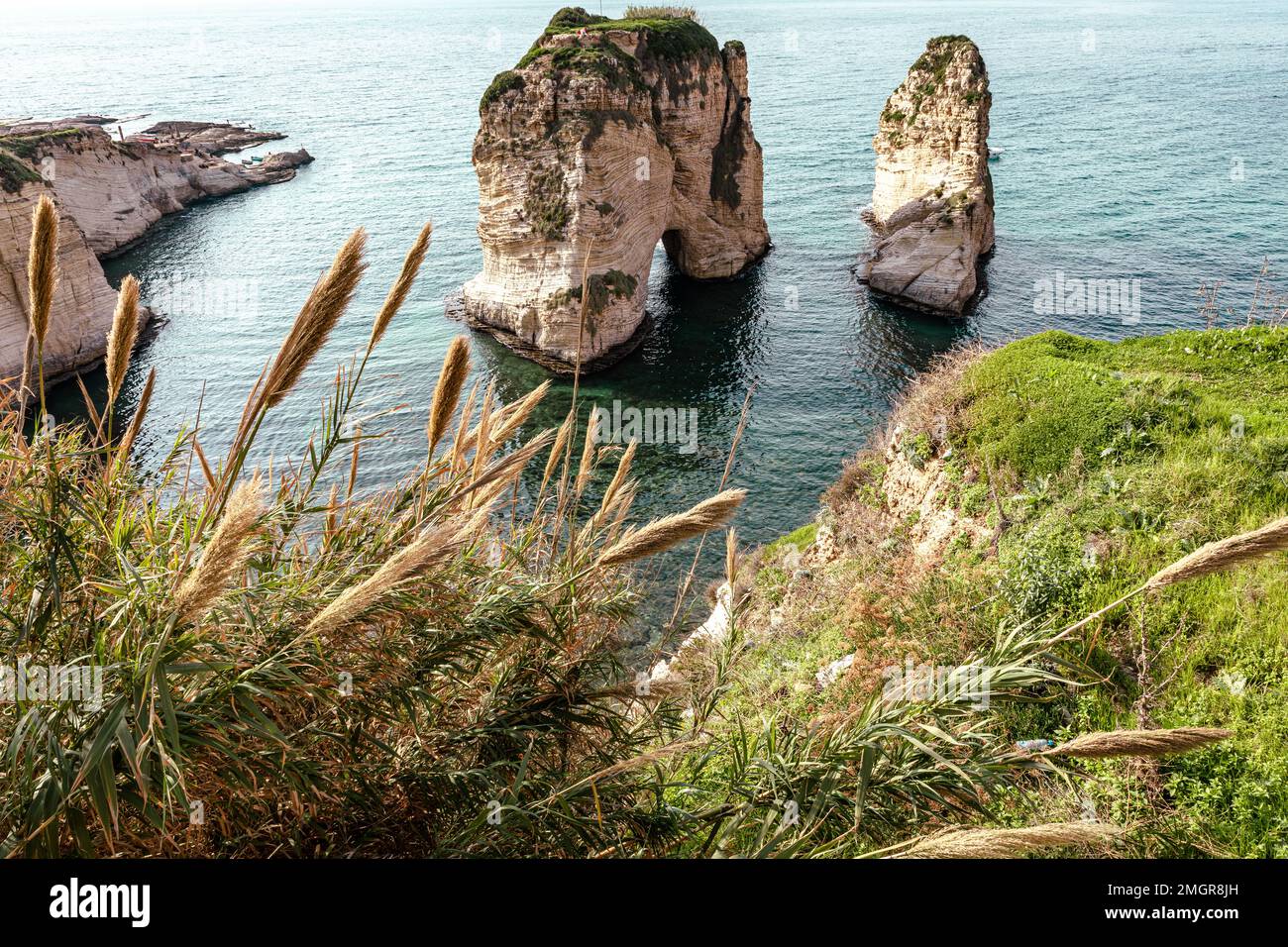Raouche Rocks in Beirut, Lebanon in the sea during daytime. Pigeon ...