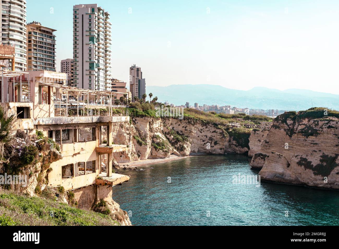 Raouche Rocks in Beirut, Lebanon in the sea during daytime. Pigeon ...