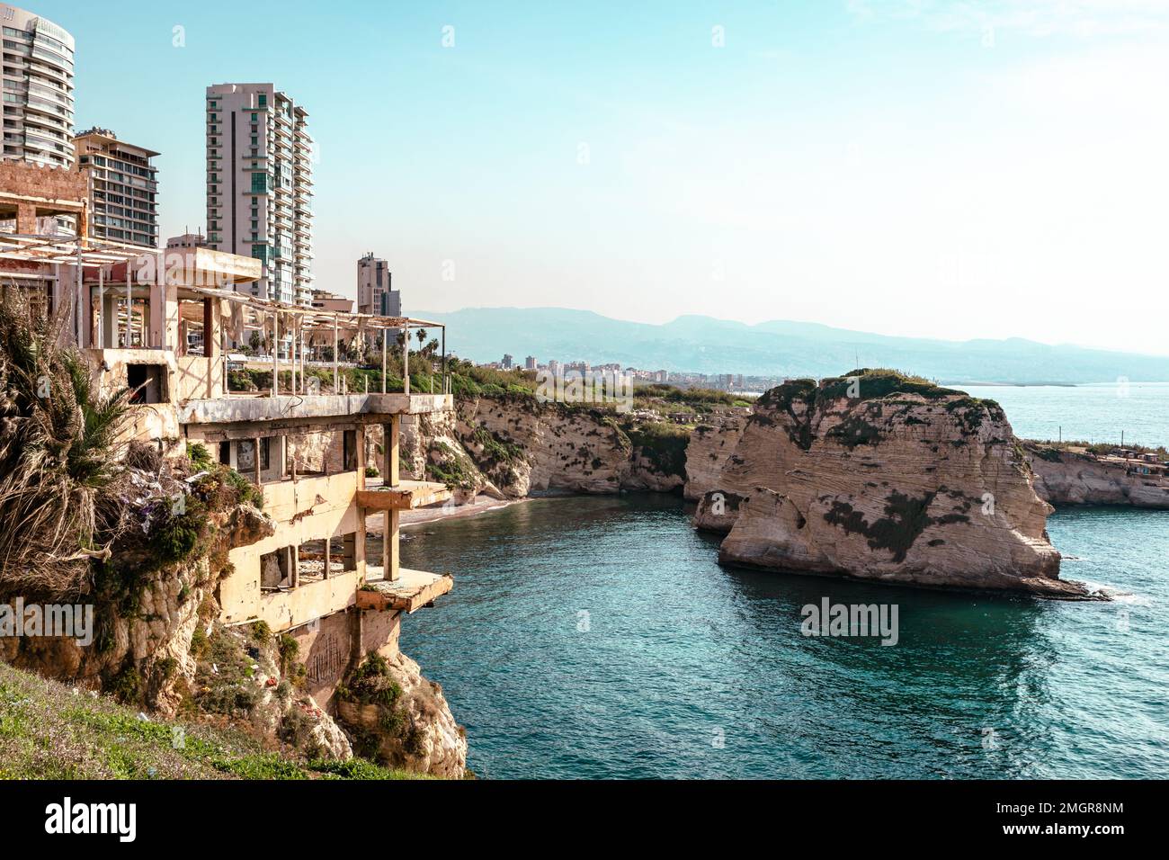 Raouche Rocks in Beirut, Lebanon in the sea during daytime. Pigeon ...