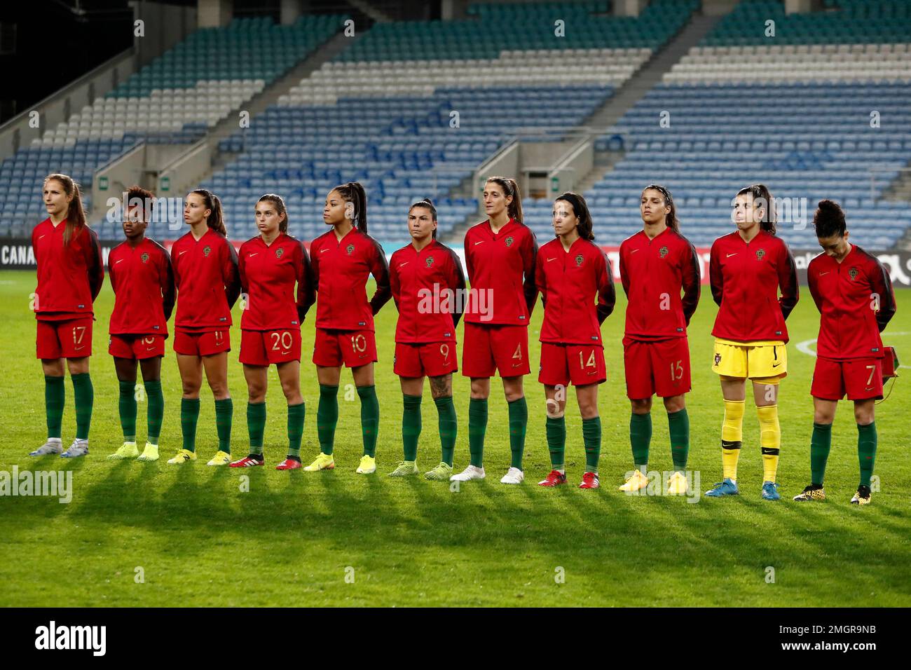 The Portuguese players stand during the national anthems before the ...