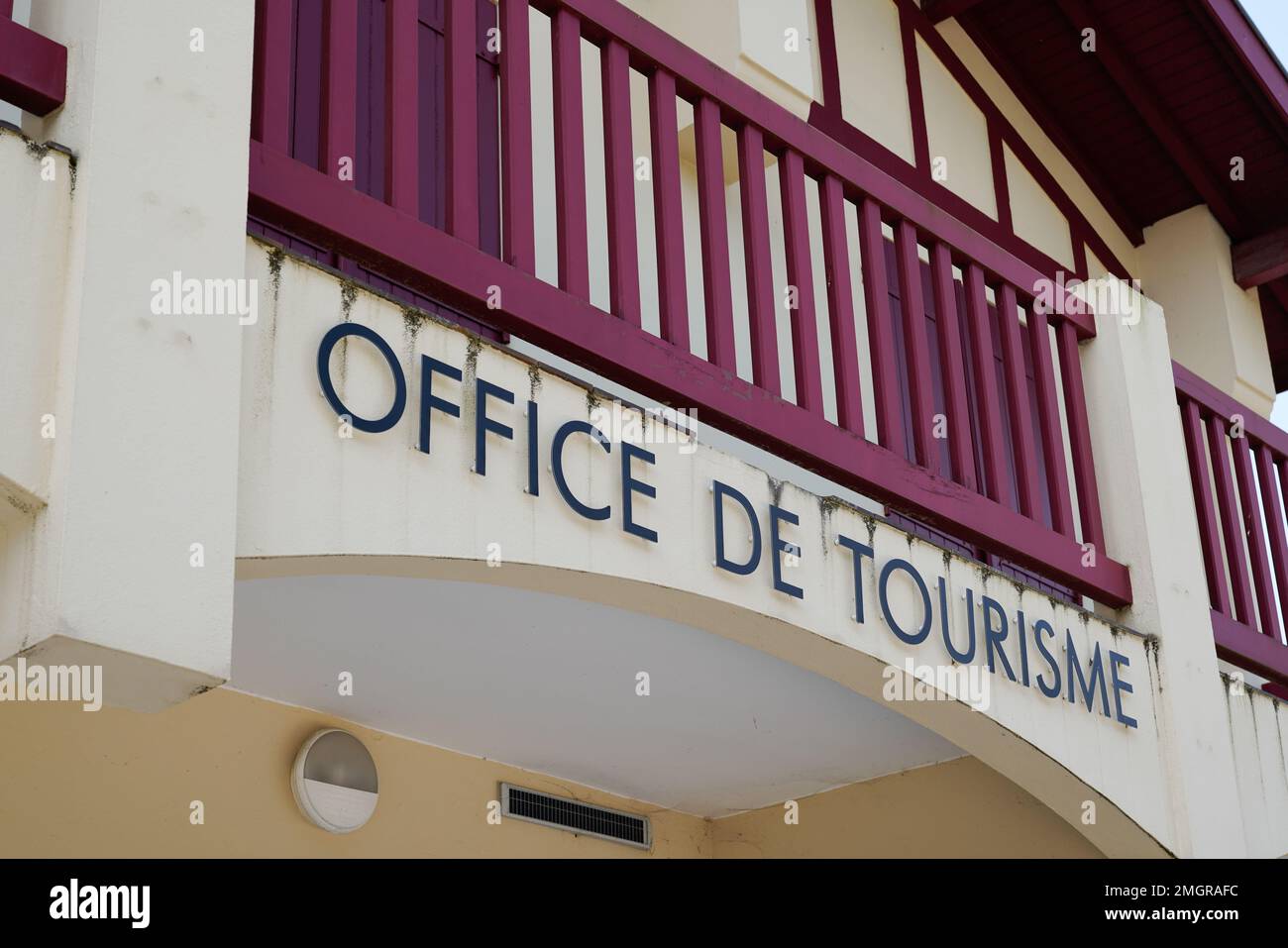 office de tourisme france text means tourism agency sign in French ...