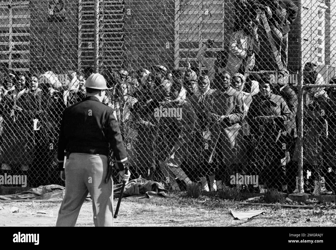 FILE - In this Feb. 4, 1965, file photo, a policeman stands guard ...