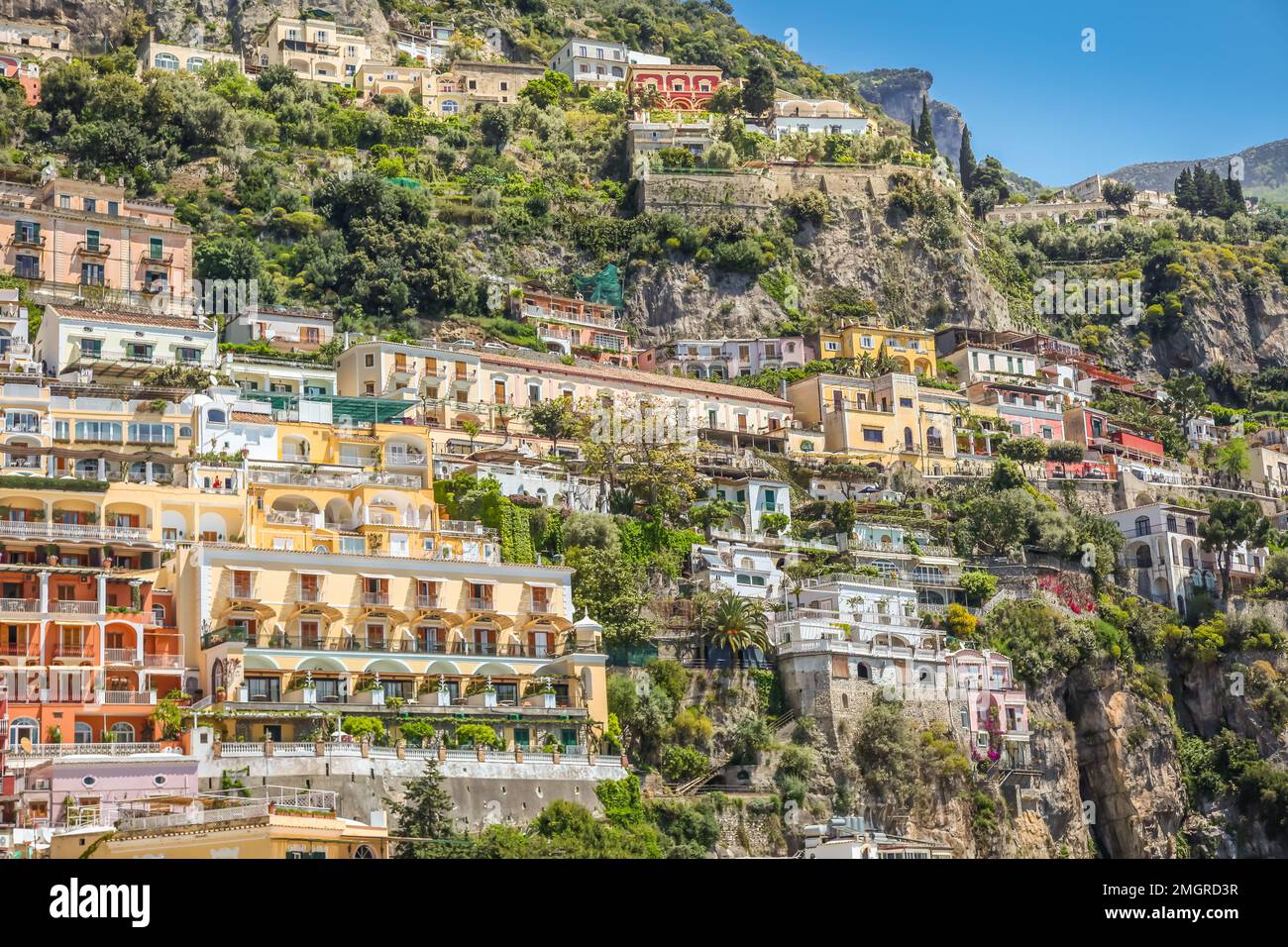 Above Positano city cliffs and marina with boats and yacht, amalfi ...