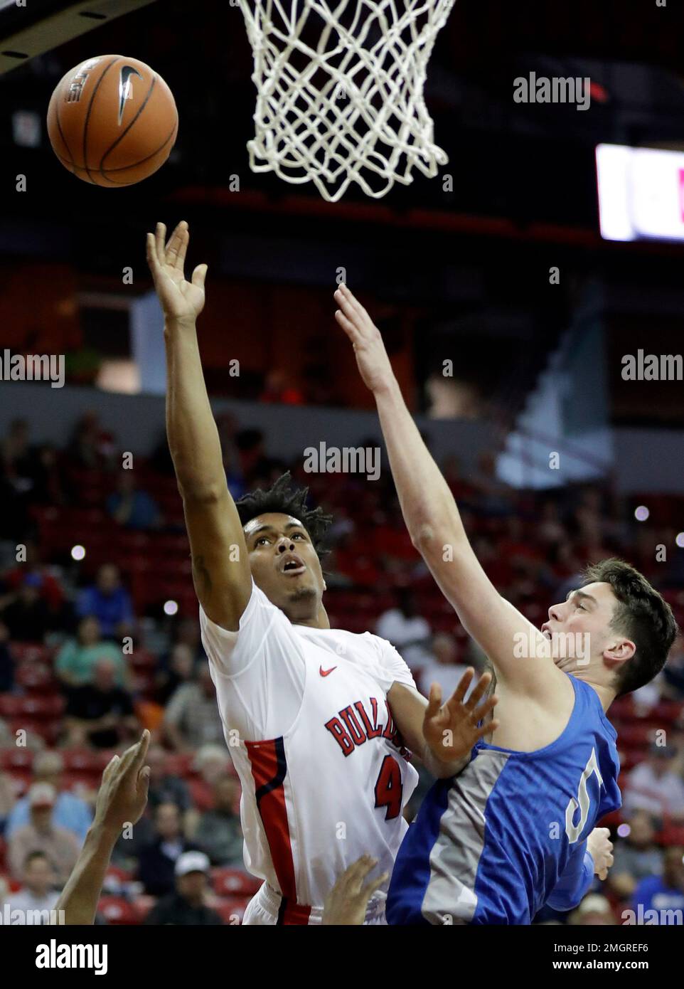 Fresno State's Niven Hart (4) shoots as Air Force's Christopher Joyce ...