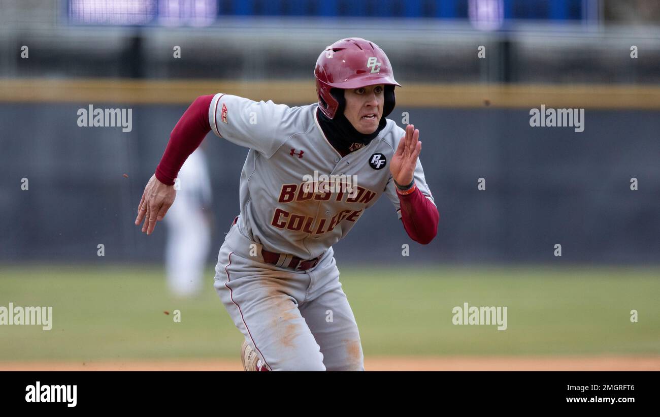 Boston College's Sal Frelick (11) scores a run during an NCAA baseball ...