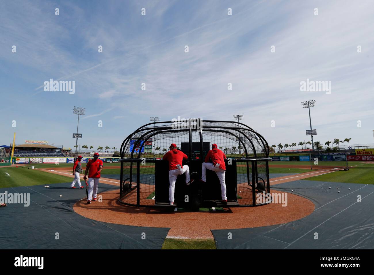 Philadelphia Phillies coaches watch batting practice during pregame of ...