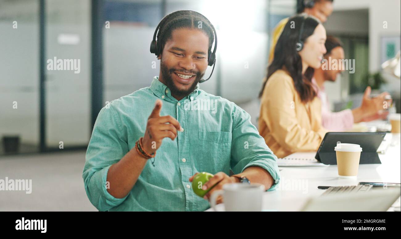 Call center, customer service and a business black man writing in a ...