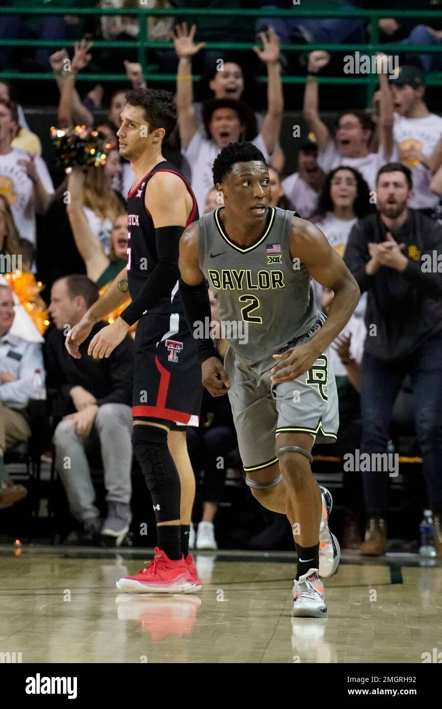 Baylor's Devonte Bandoo (2) reacts after making a three point basket ...