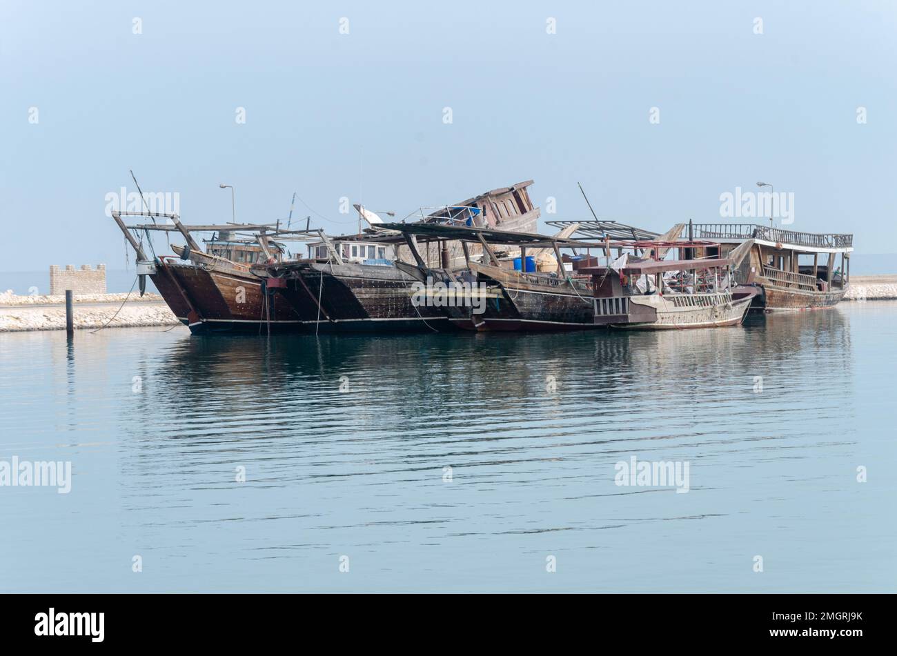 Traditional Dhow boats opposite National Museum of Qatar, Doha, Qatar ...