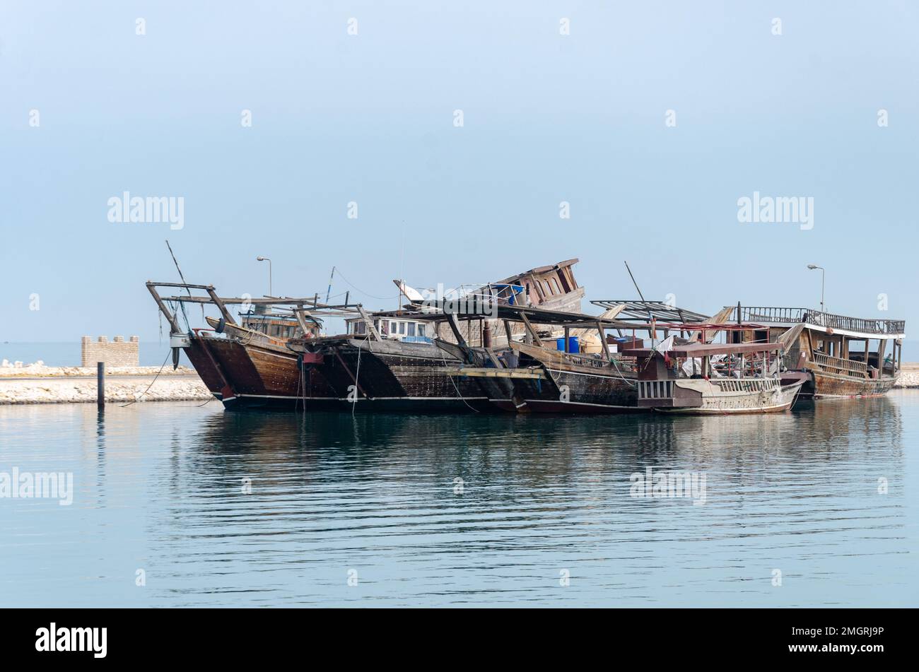 Traditional Dhow boats opposite National Museum of Qatar, Doha, Qatar ...