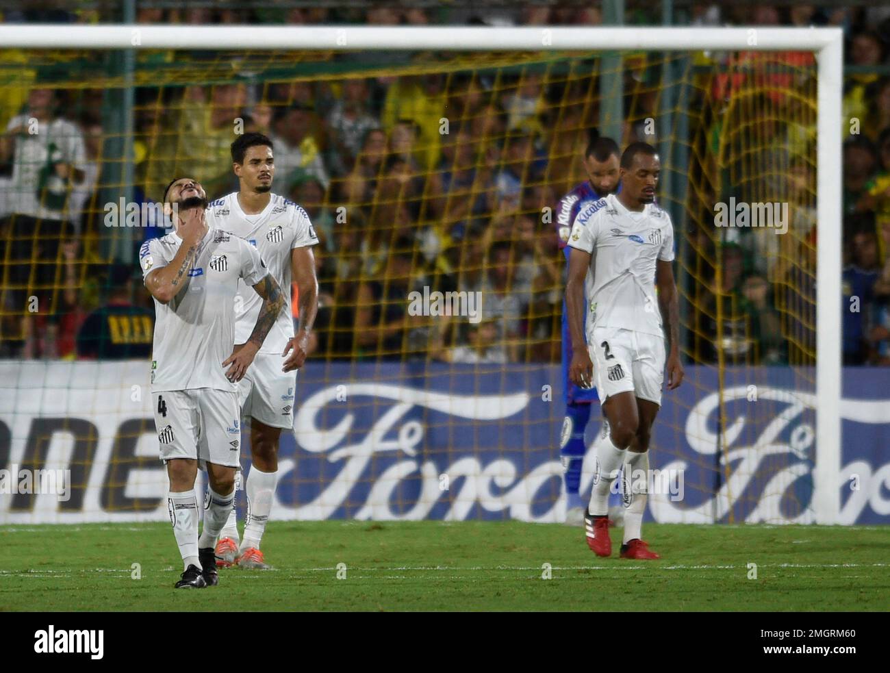 Para, left, and Luiz Felipe, right, of Brazil's Santos reacts after a ...