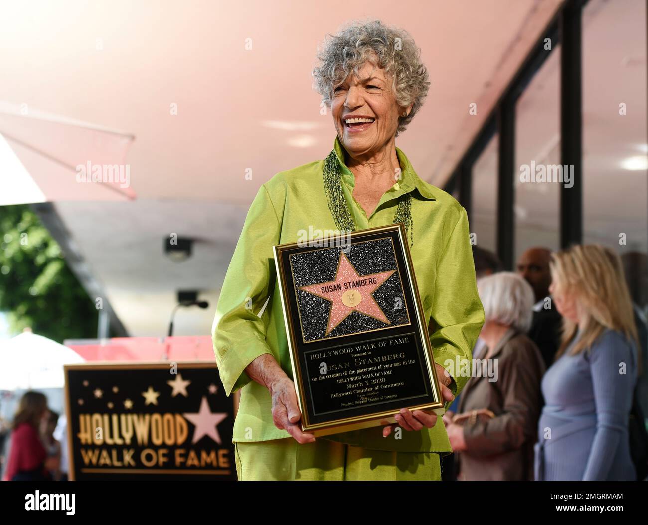 National Public Radio broadcast journalist Susan Stamberg holds up a ...