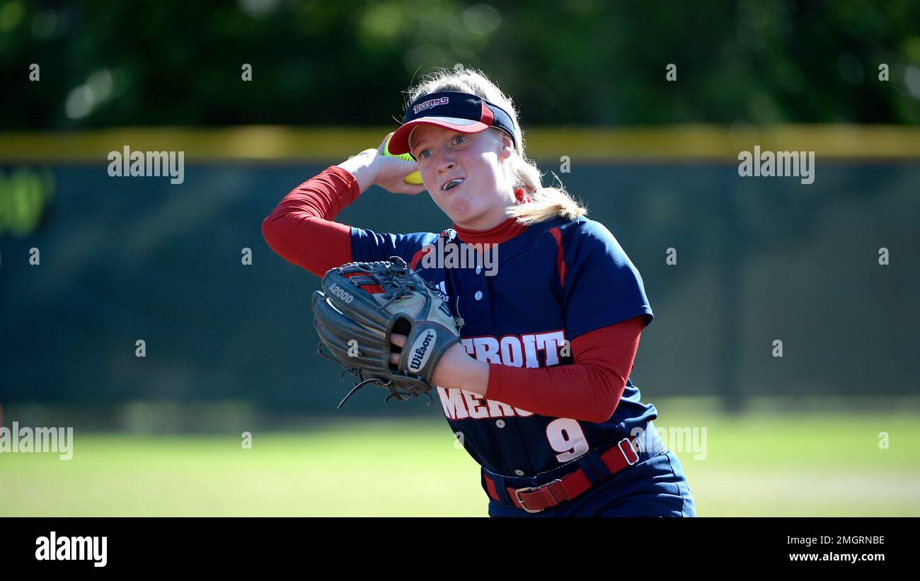 Detroit Mercy's Piper Roth (9) warms up before an NCAA college softball ...