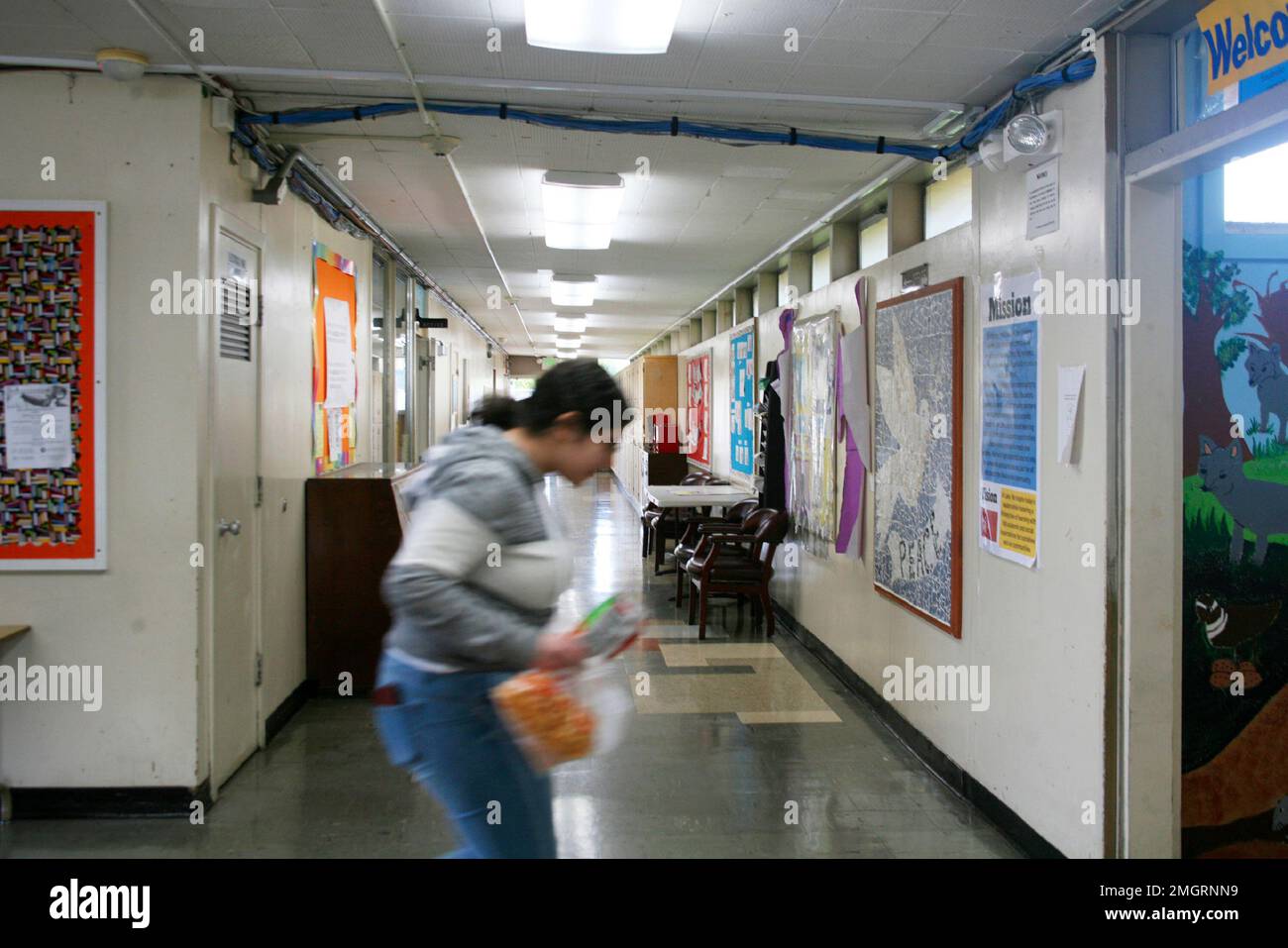 FILE - In this Jan. 27, 2020 file photo, a student walks through a ...