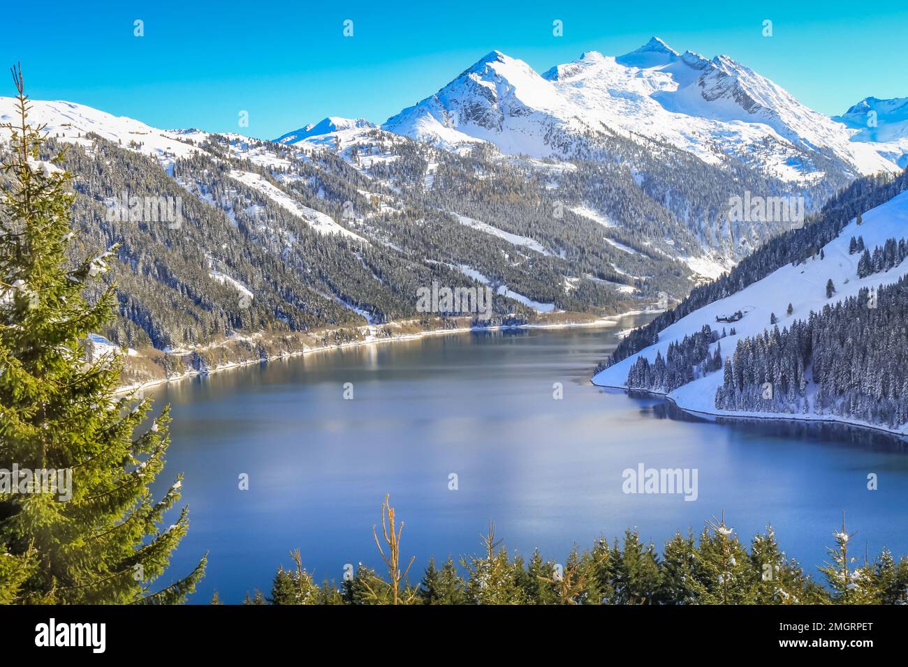 Alpine lake reservoir near Zillertal alps valley, Tyrol alps, Austria ...
