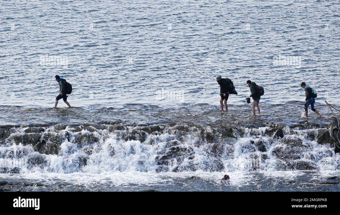 Migrants cross the Maritsa river on their way to the Greek border, near ...