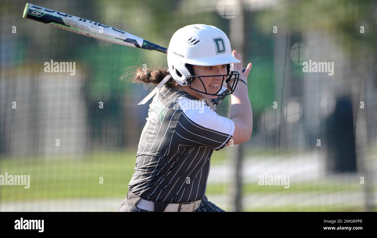 Dartmouth's Loghan Thomas hits a pitch during an NCAA softball game ...