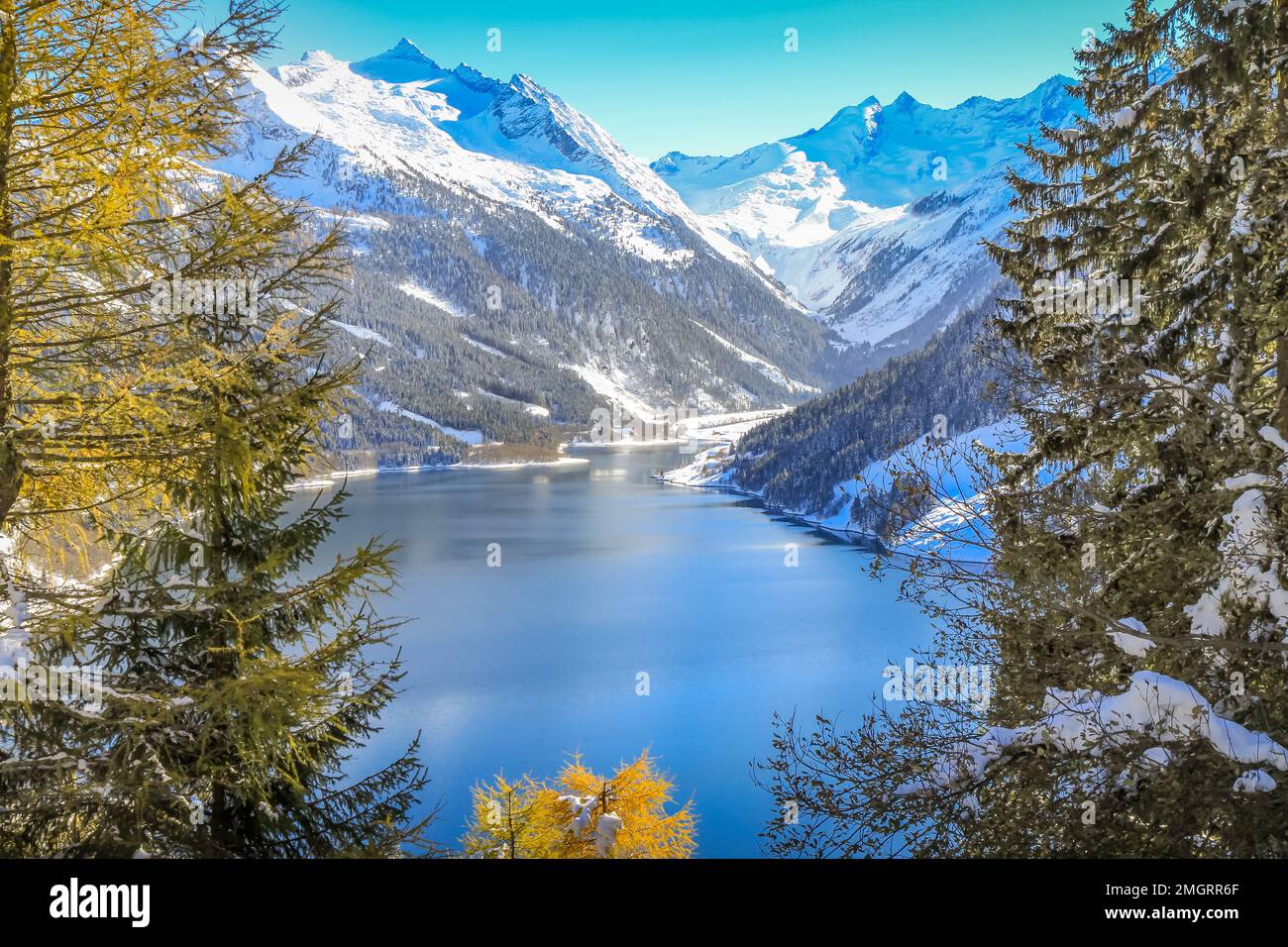Alpine lake reservoir near Zillertal alps valley, Tyrol alps, Austria ...