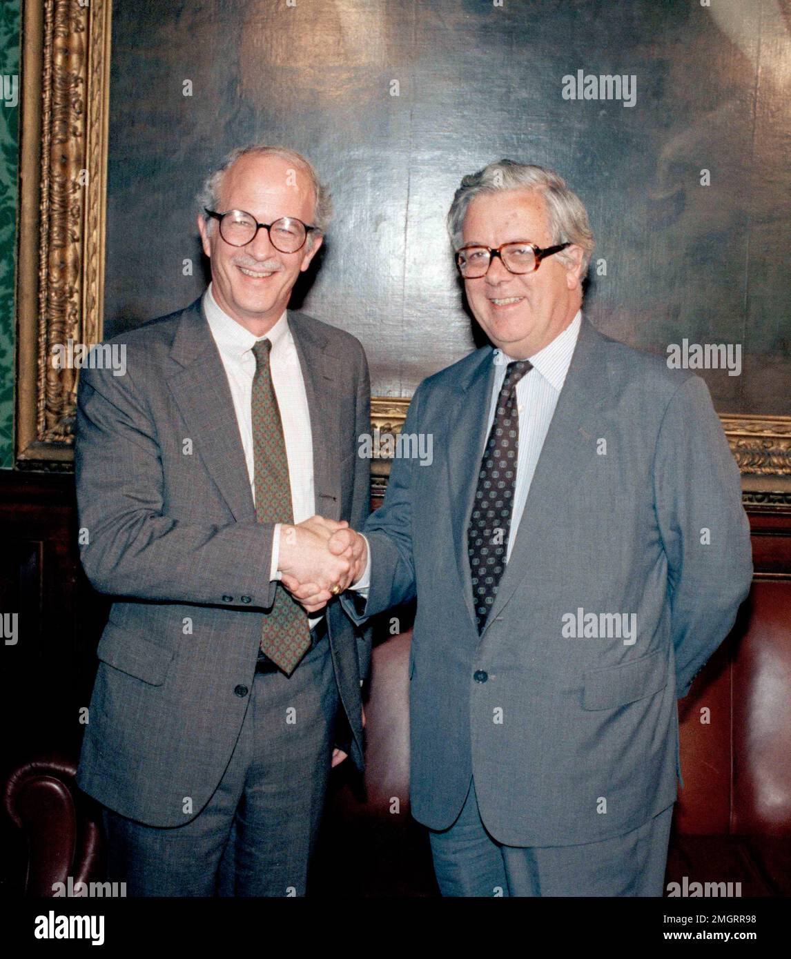 British Foreign Secretary Sir Geoffrey Howe, right, shakes hands with U ...