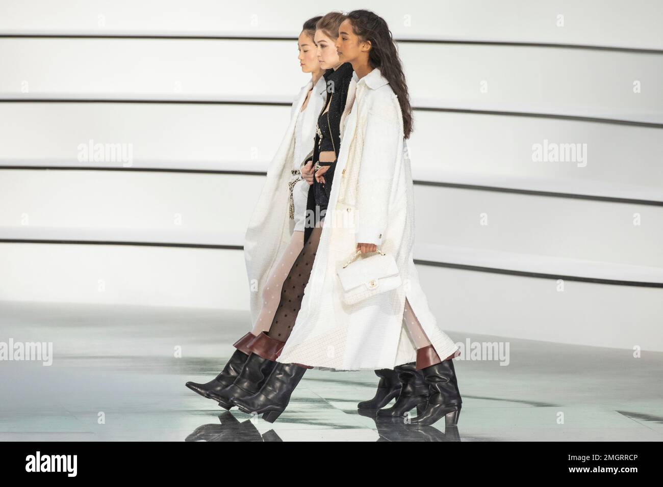 Model Gigi Hadid, centre, walks with other models as they wear ...