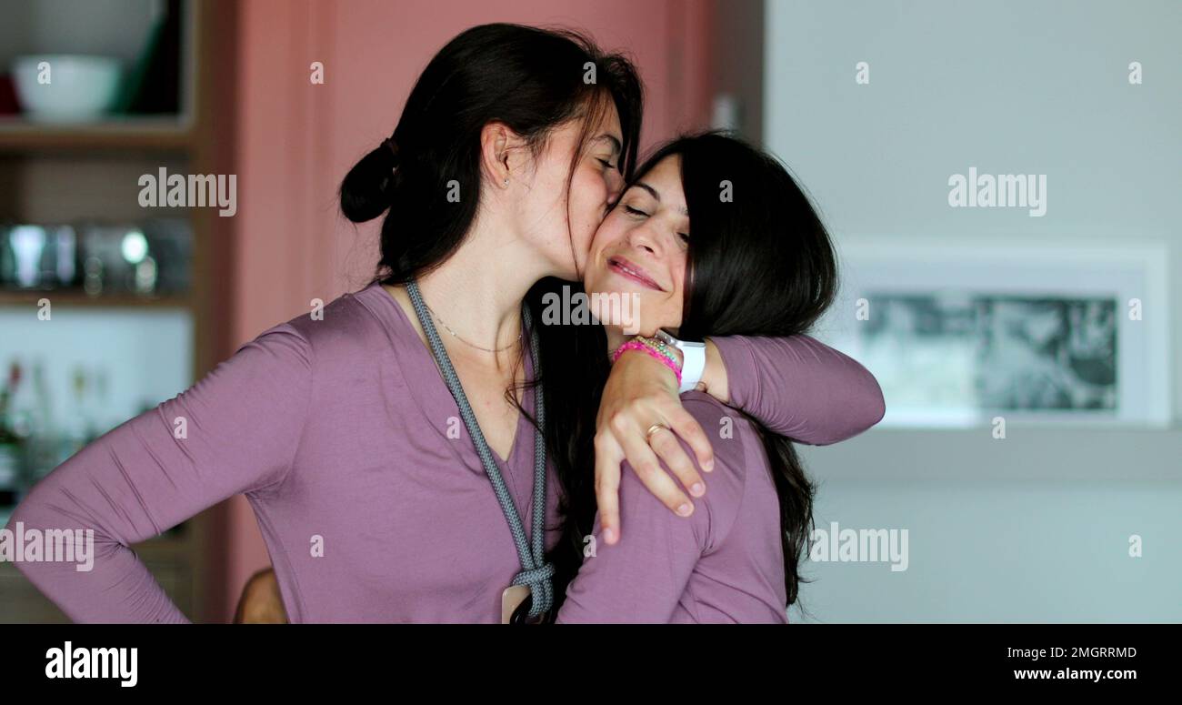 Twin Sisters Posing Together Two Women Friends Embrace And Love Stock
