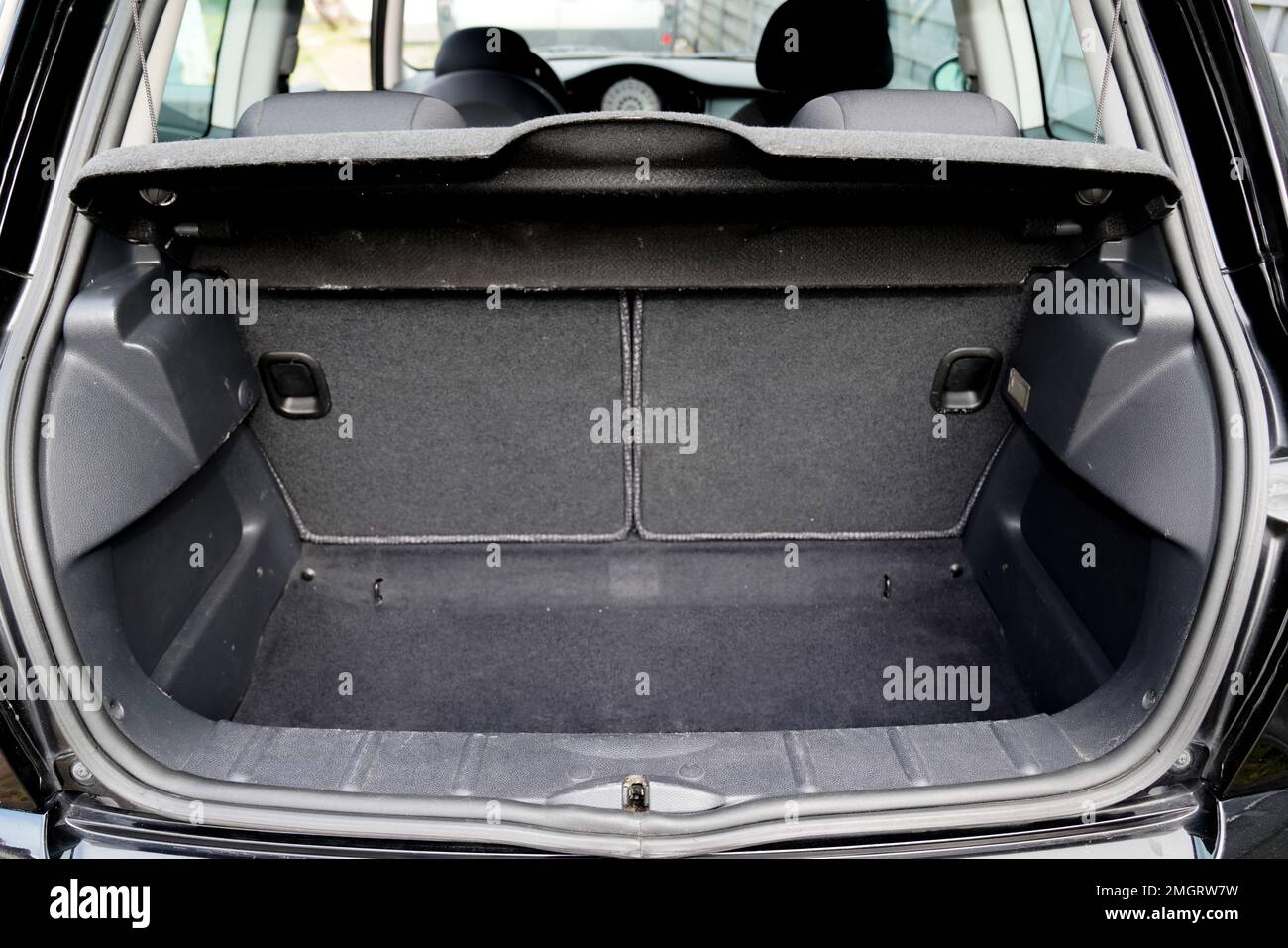 open black trunk rear in modern small city car Stock Photo - Alamy