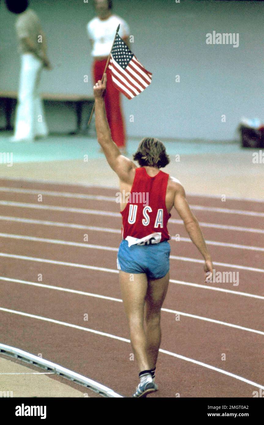 Decathlon gold medalist Bruce Jenner waves an American flag after ...