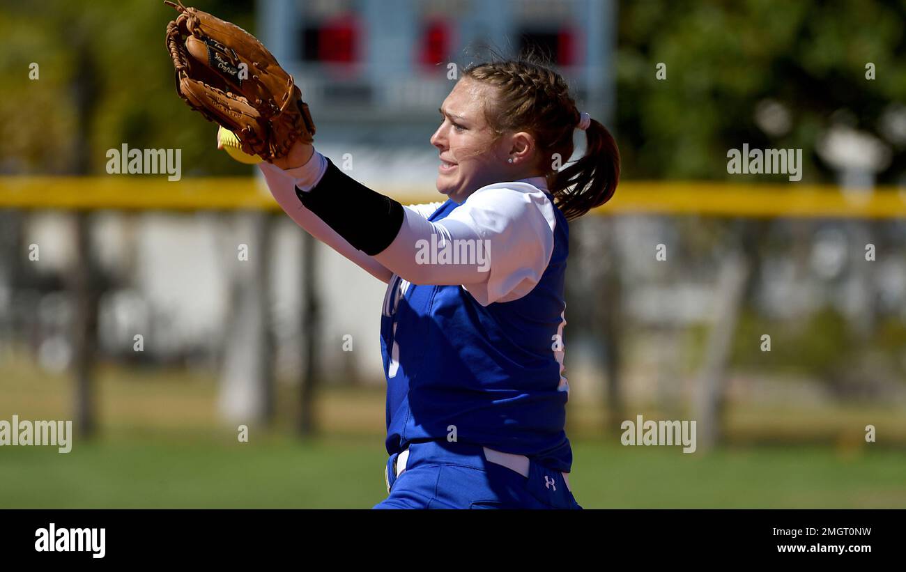 Seton Hall's Kelsey Gumm fires at batters during an NCAA softball game ...